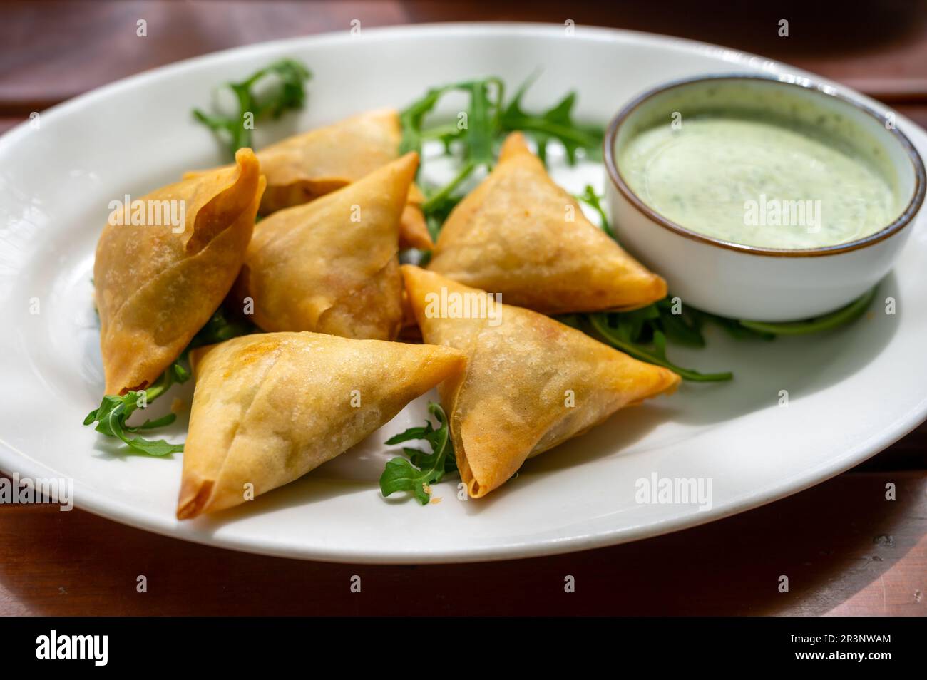 Traditional Middle East snack fried stuffed samosa pies with vegetables ...