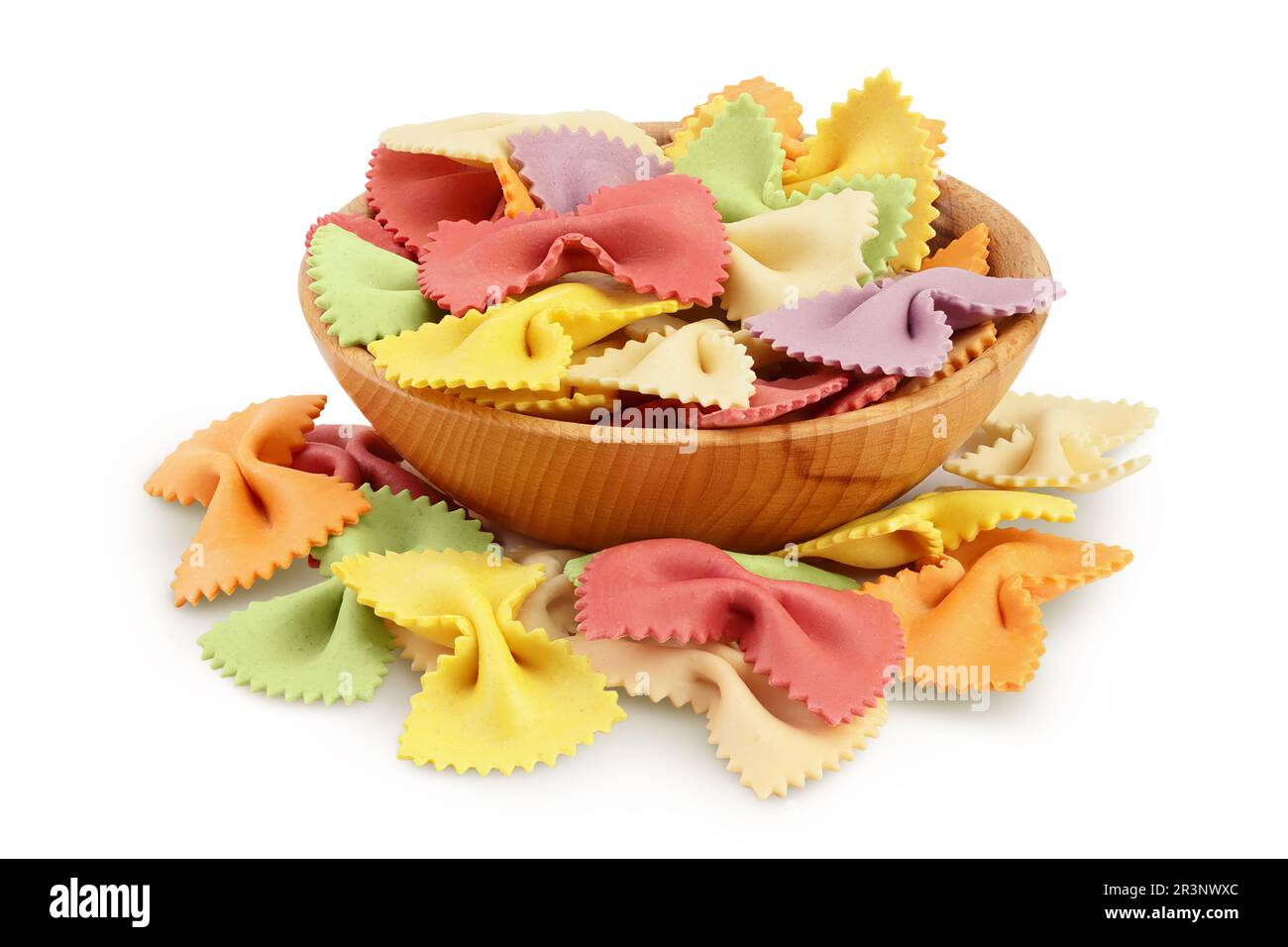 colorful farfalle pasta in wooden bowl isolated on white background ...