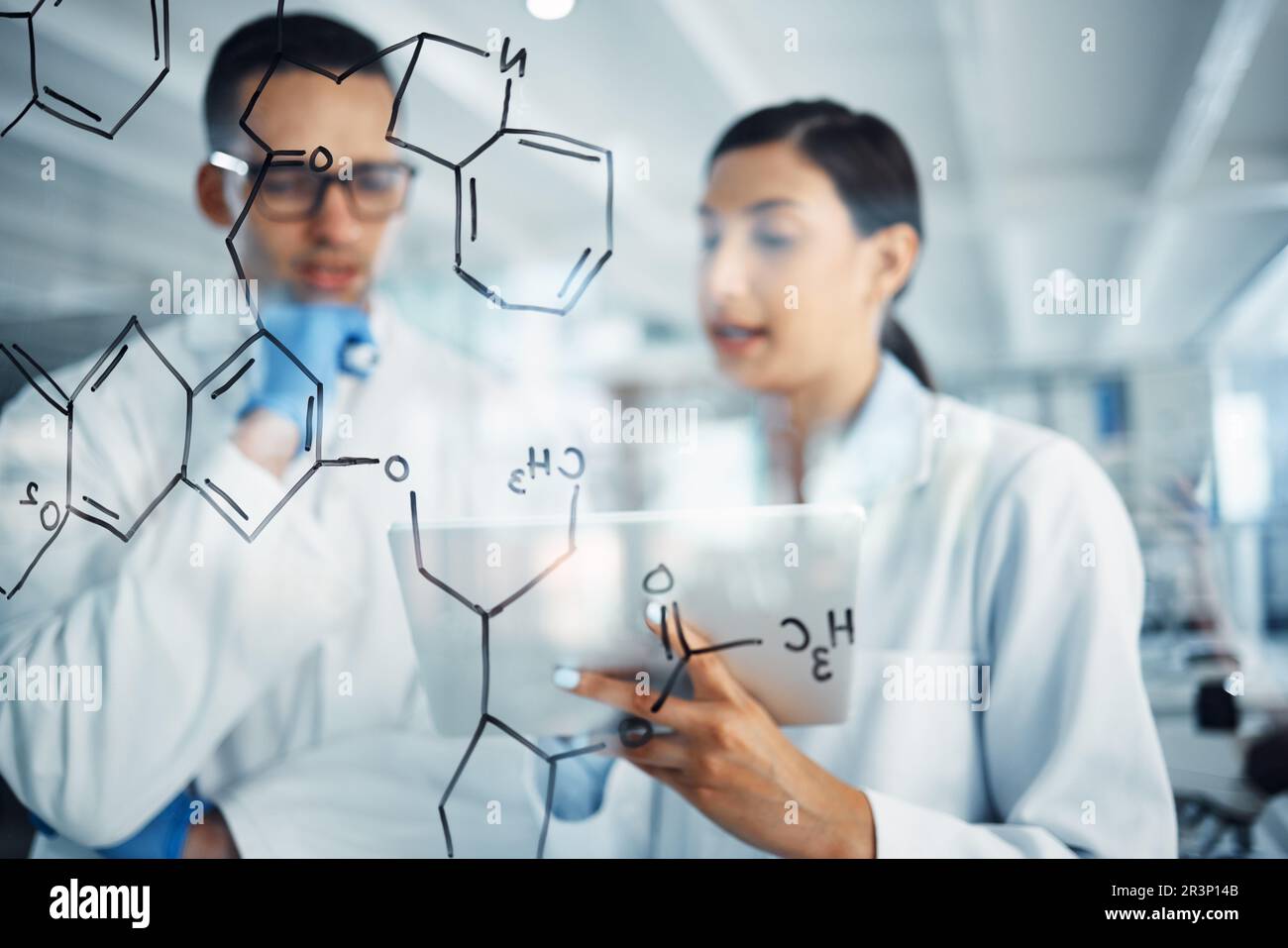 Science, tablet and man and woman with chemistry equation for medical ...