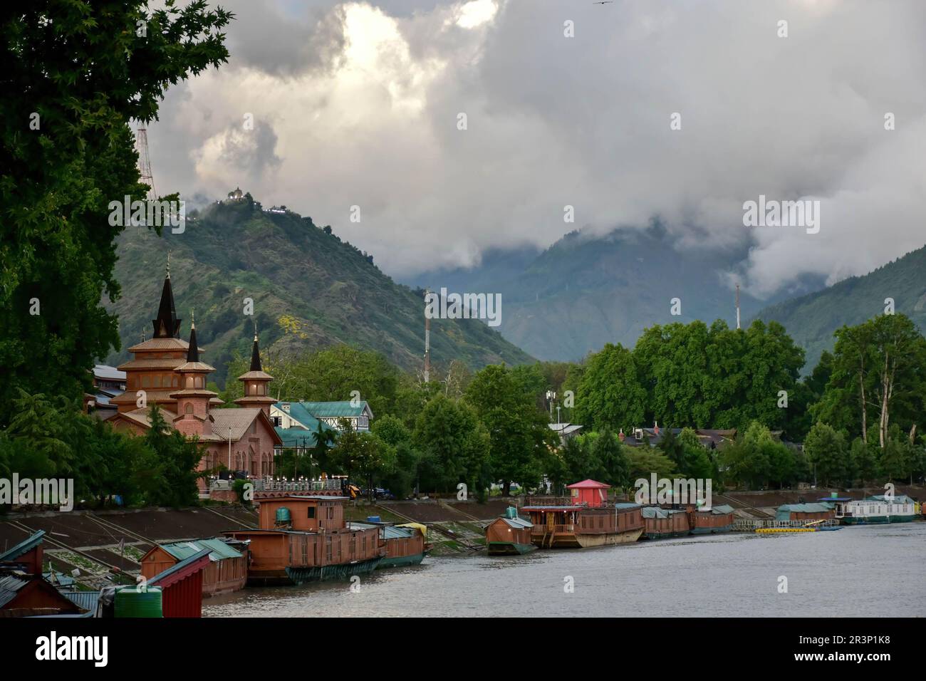 Srinagar, India. 24th May, 2023. Residential houseboats in river Jehlum ...