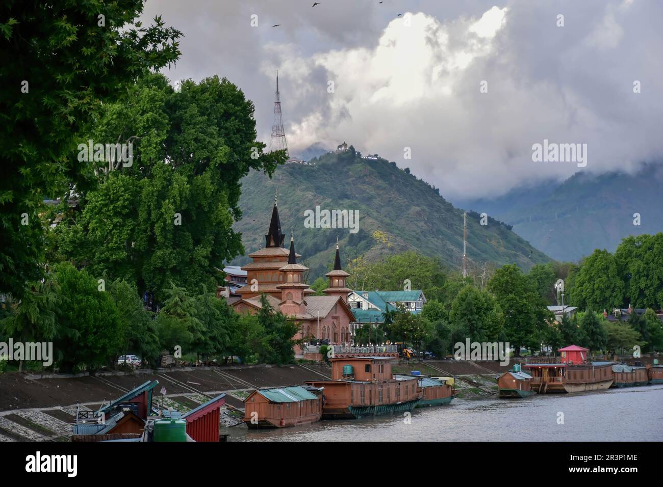 Srinagar, India. 24th May, 2023. Residential houseboats in river Jehlum ...