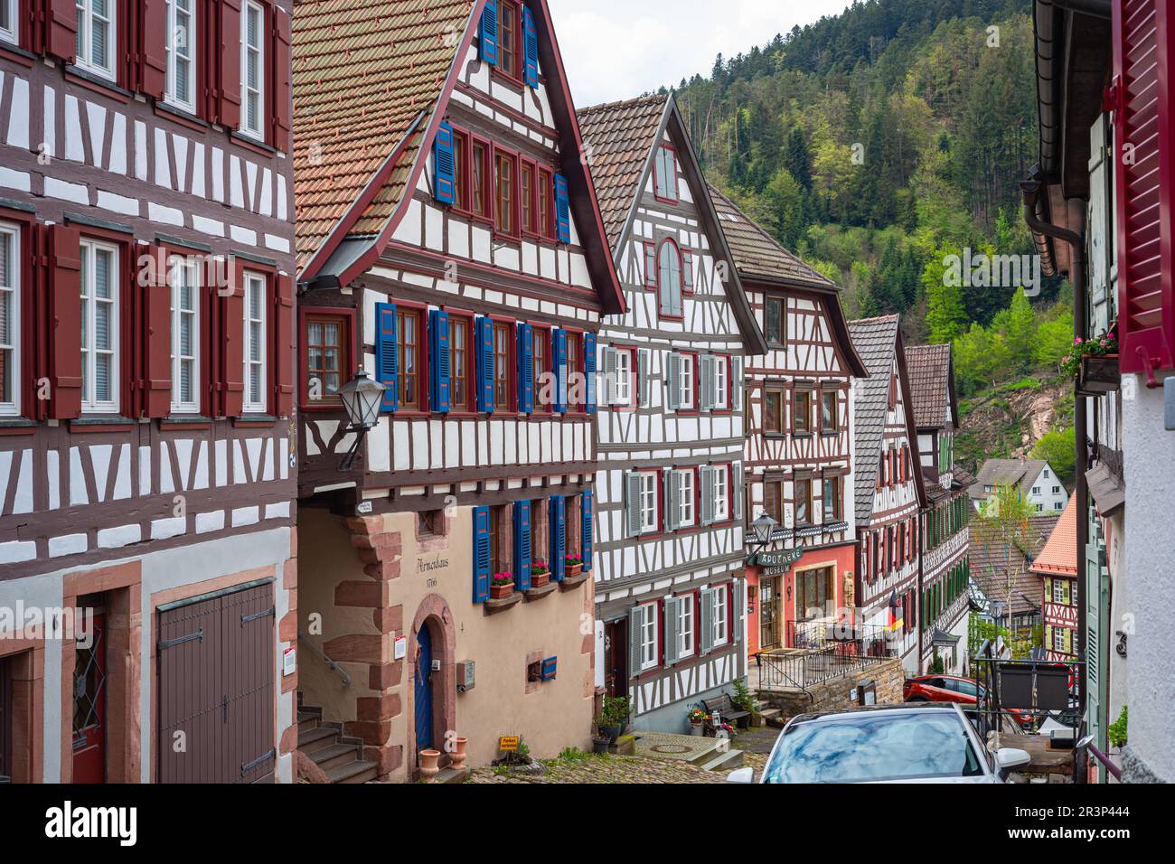 Street with traditional half timbered german houses in the old village ...