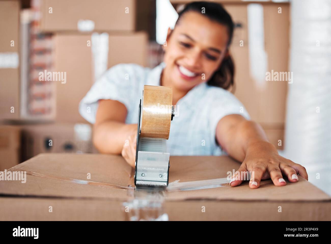 Woman, cardboard and closing box with tape while moving house with ...