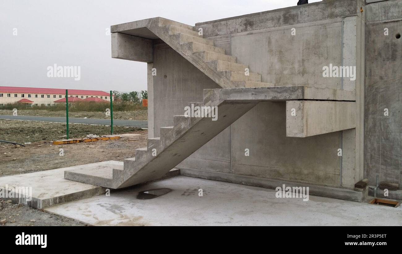 Picture of straight precast concrete stairs with landings completely ...