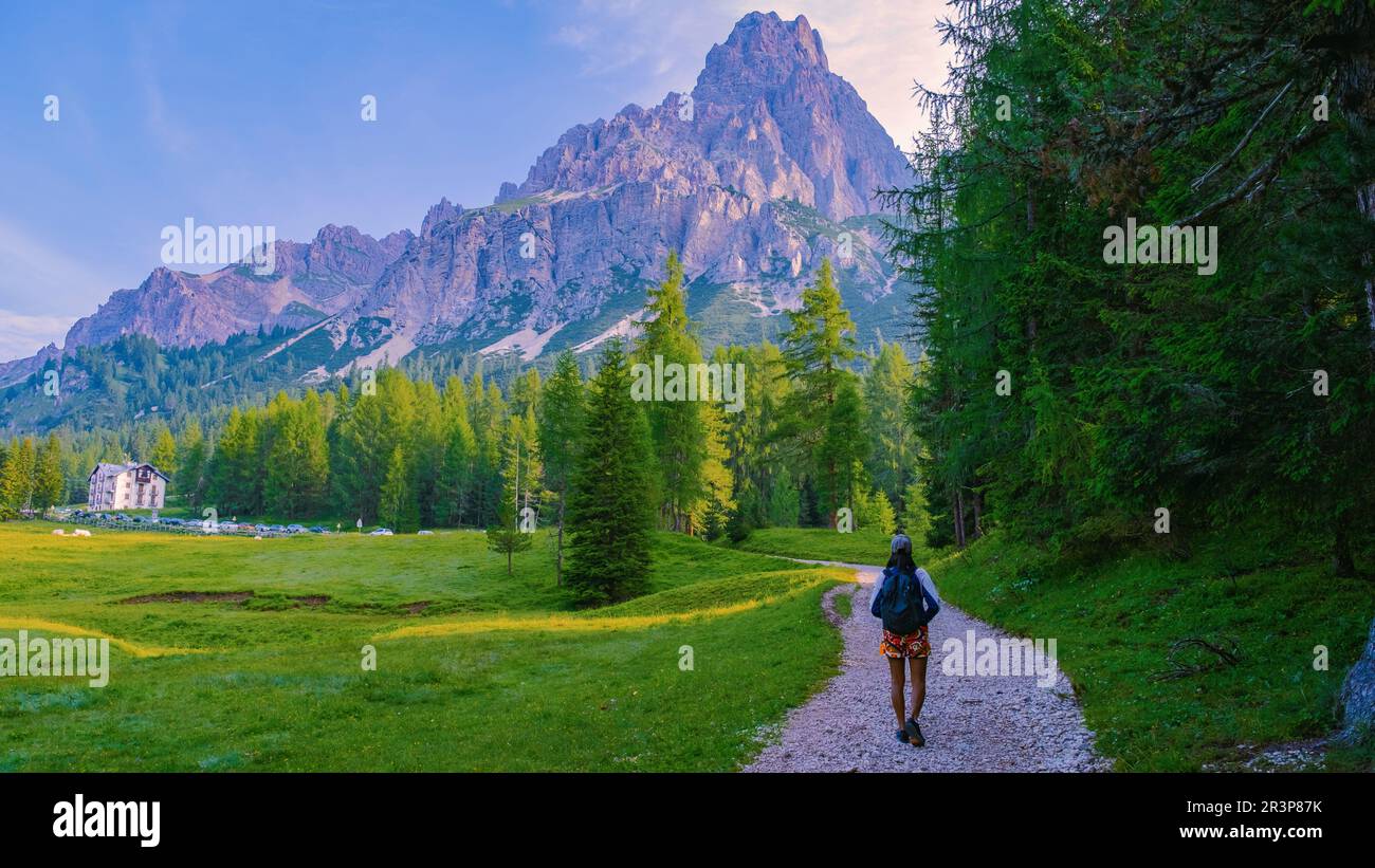 Woman hiking in the Italian Dolomites, Girl hiking to Lago Di Sorapis ...