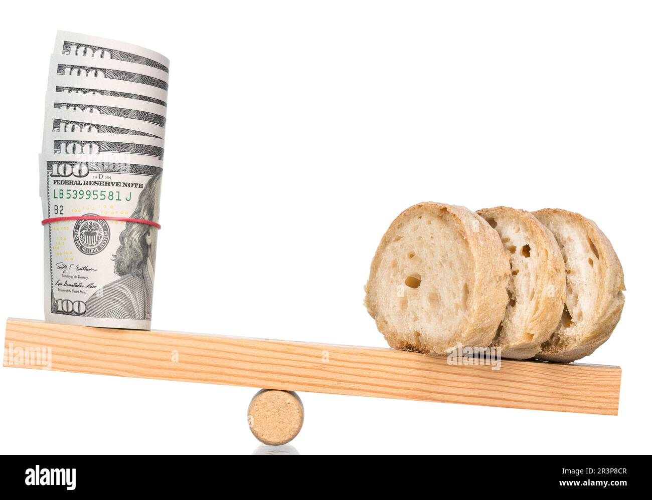Inflation. Balance with bread and money Stock Photo - Alamy