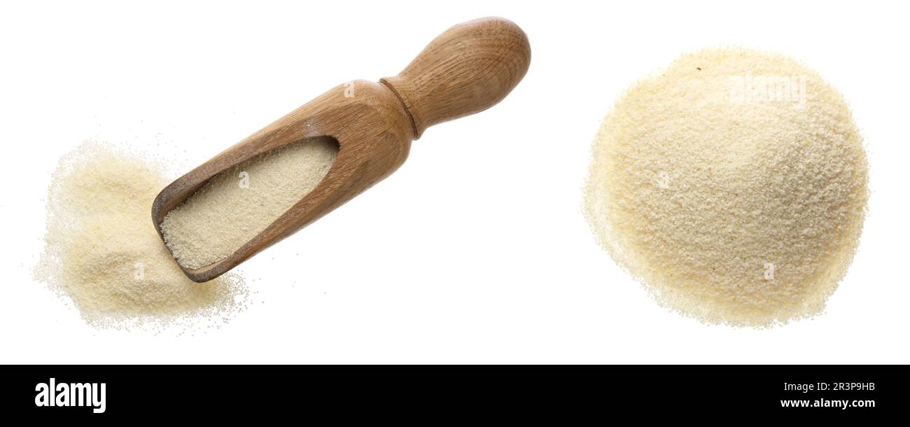 raw semolina in wooden scoop isolated on white background. Top view ...