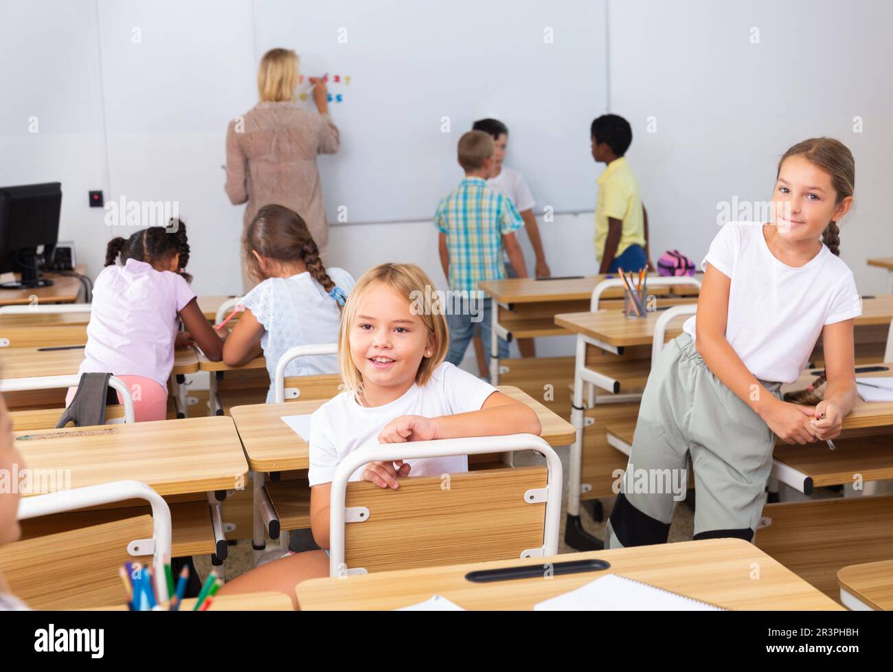 Kids pupils talking during recess between lessons Stock Photo - Alamy