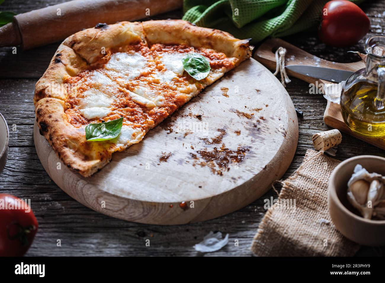 Italian Pizza Napoletana in Messy Kitchen with Cooking Ingredients such ...