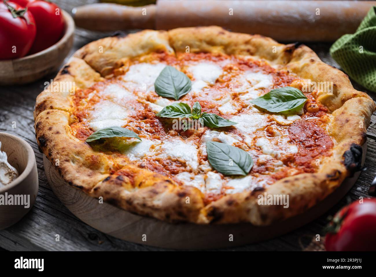 Italian Pizza Napoletana in Messy Kitchen with Cooking Ingredients such ...