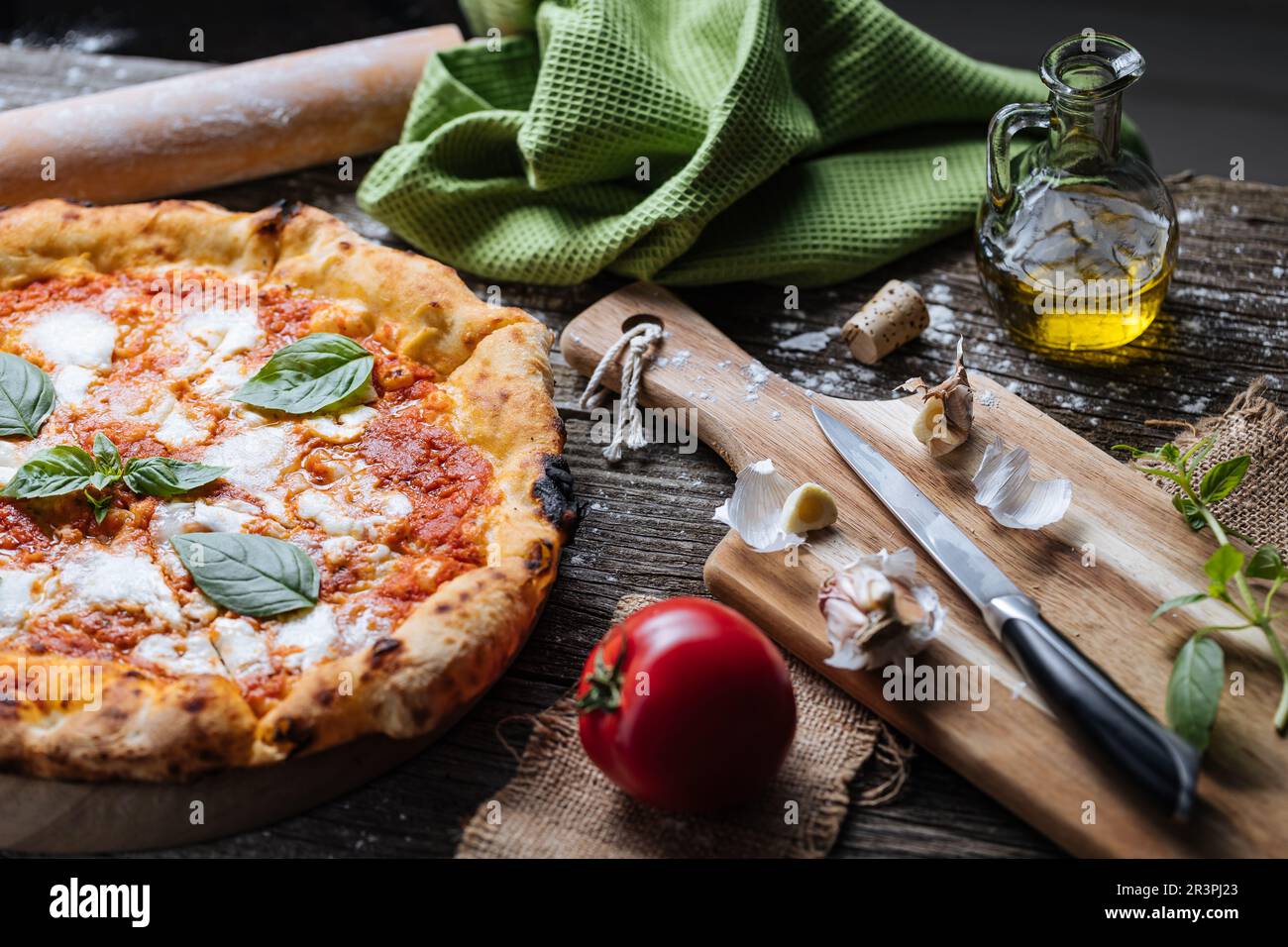 Italian Pizza Napoletana in Messy Kitchen with Cooking Ingredients such ...
