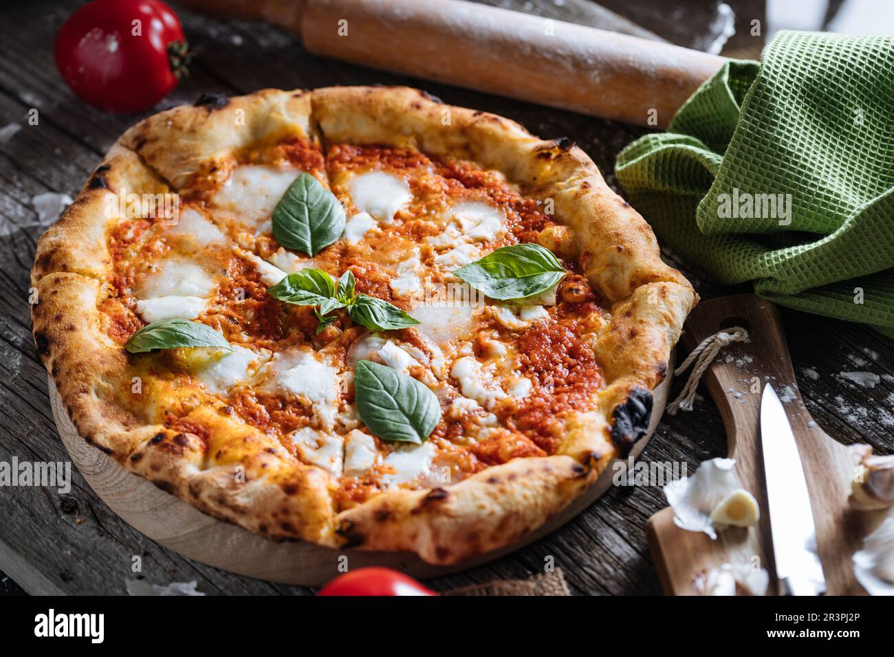 Italian Pizza Napoletana in Messy Kitchen with Cooking Ingredients such ...