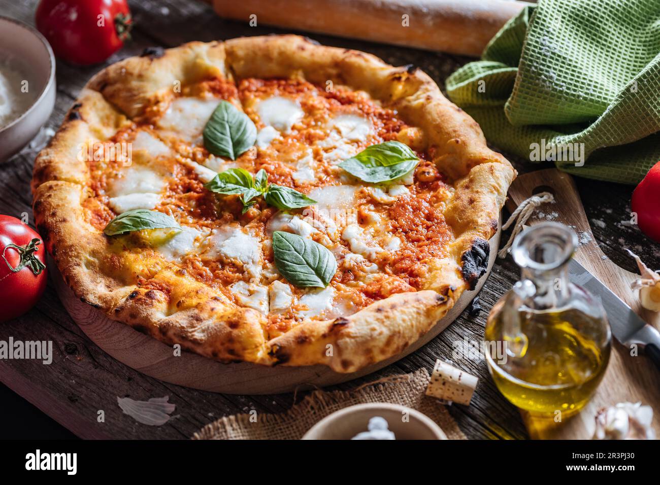 Italian Pizza Napoletana in Messy Kitchen with Cooking Ingredients such ...