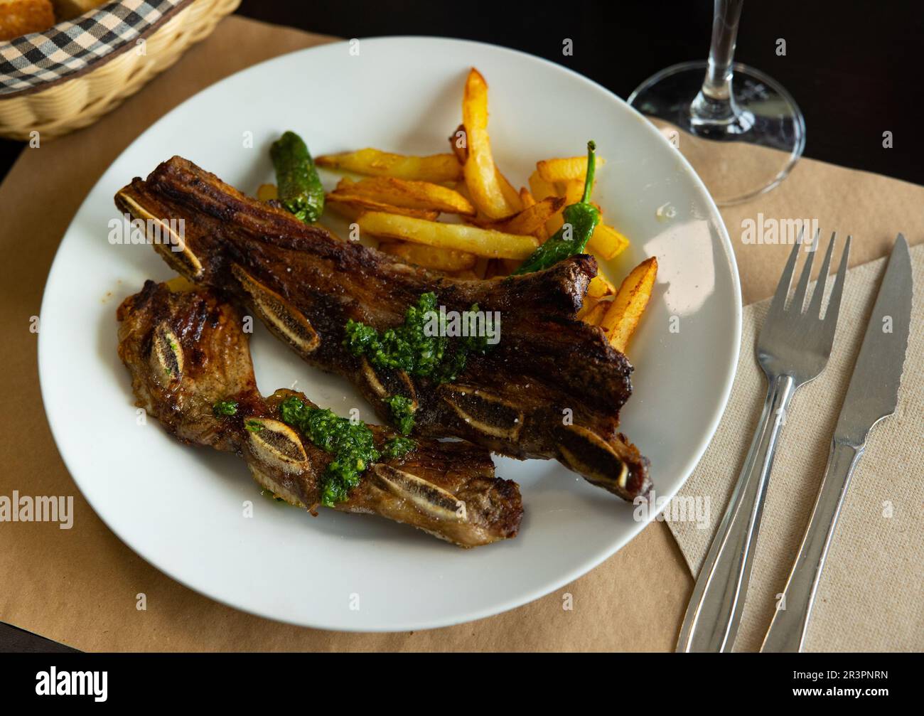 Delicious grilled Churasco beef steak with stewed peppers close up ...