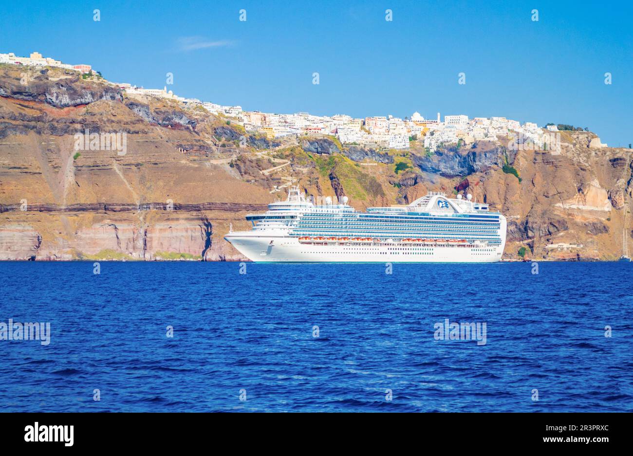 Cruise liners in the Caldera.Thousands arrive every year to spend a ...