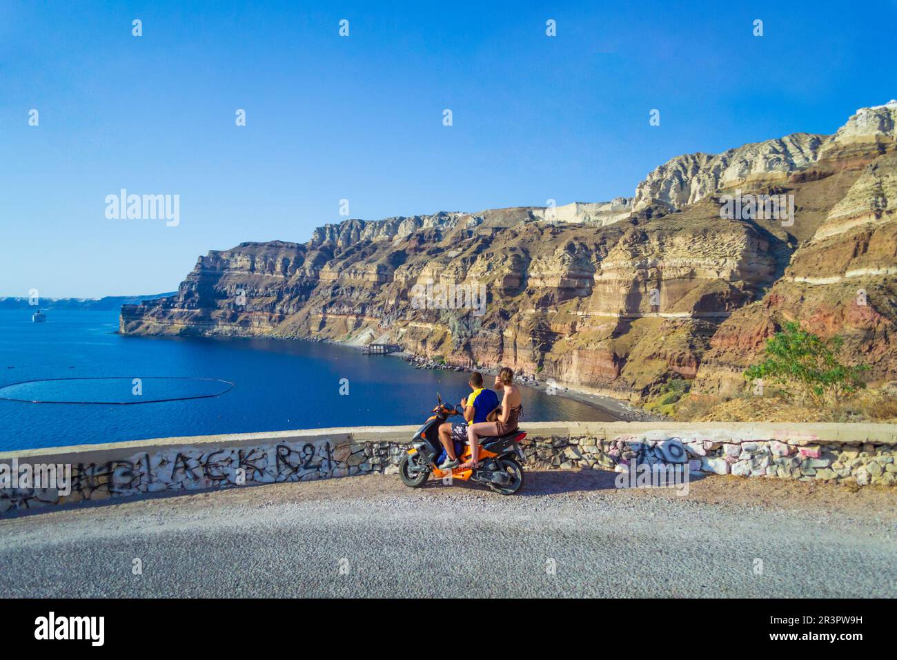 Vehicles moving on narrow winding road to Thira Santorini port,Port ...