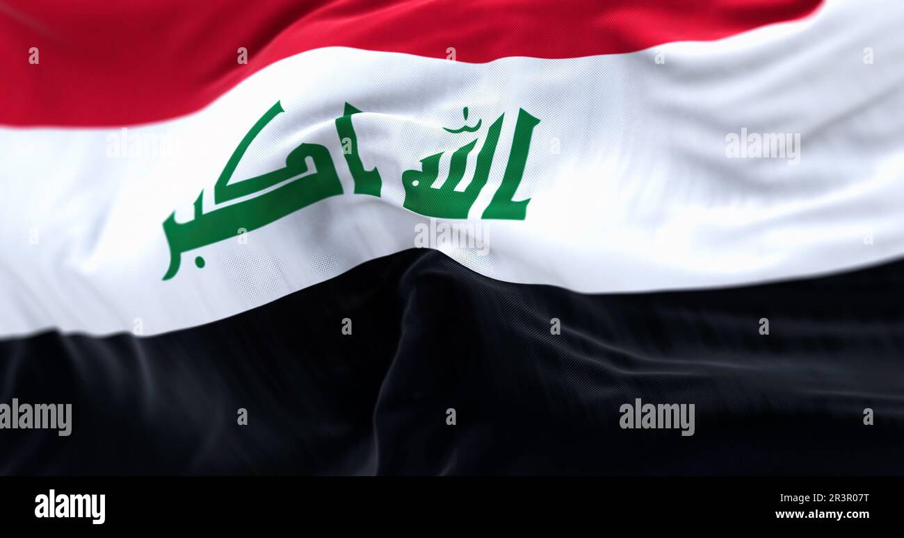 Close-up view of the Iraq national flag waving in the wind Stock Photo ...