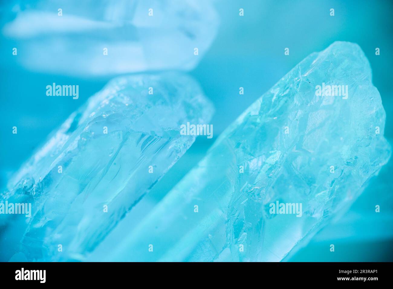 Rock crystal macro texture in blue light.transparent quartz crystals ...