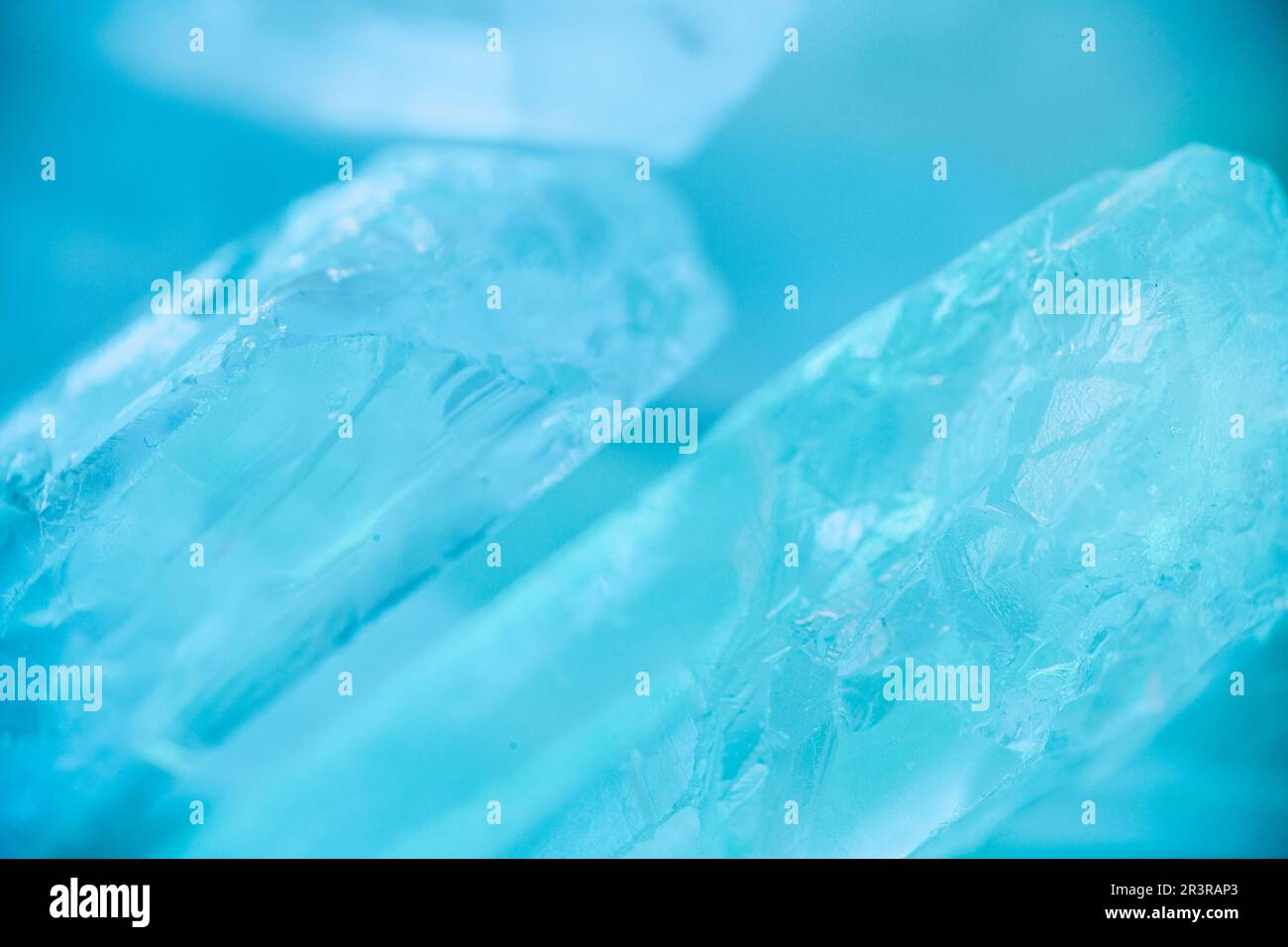 Rock crystal macro texture in blue light.transparent quartz crystals ...