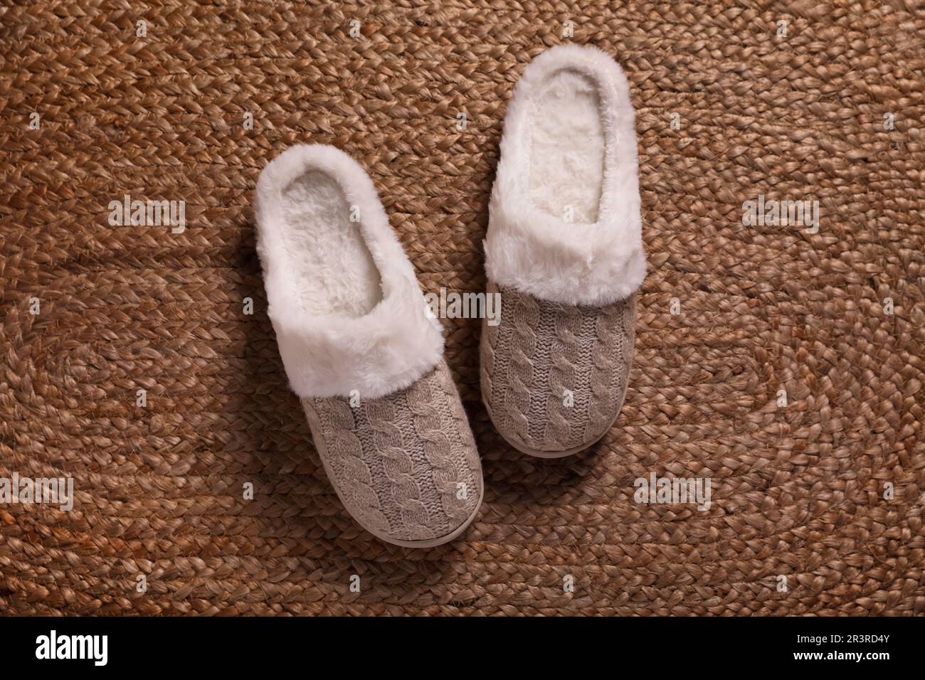 Slippers on wicker mat hi-res stock photography and images - Alamy