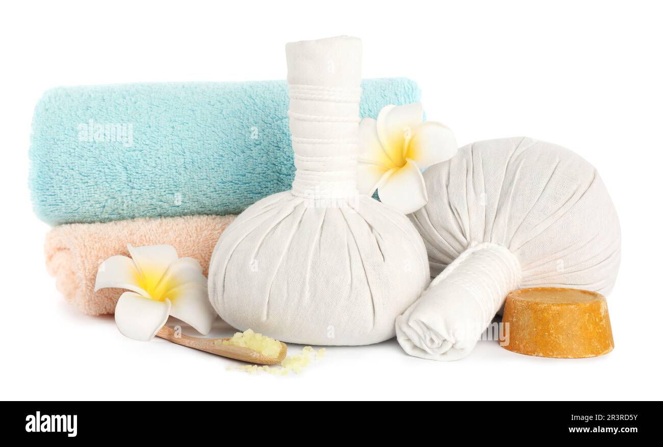 Herbal massage bags and other spa products on white background Stock ...