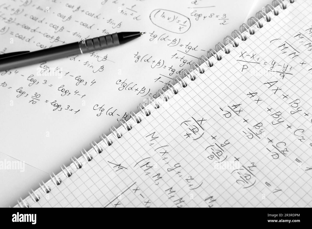 Paper with different mathematical formulas and pen, closeup Stock Photo ...