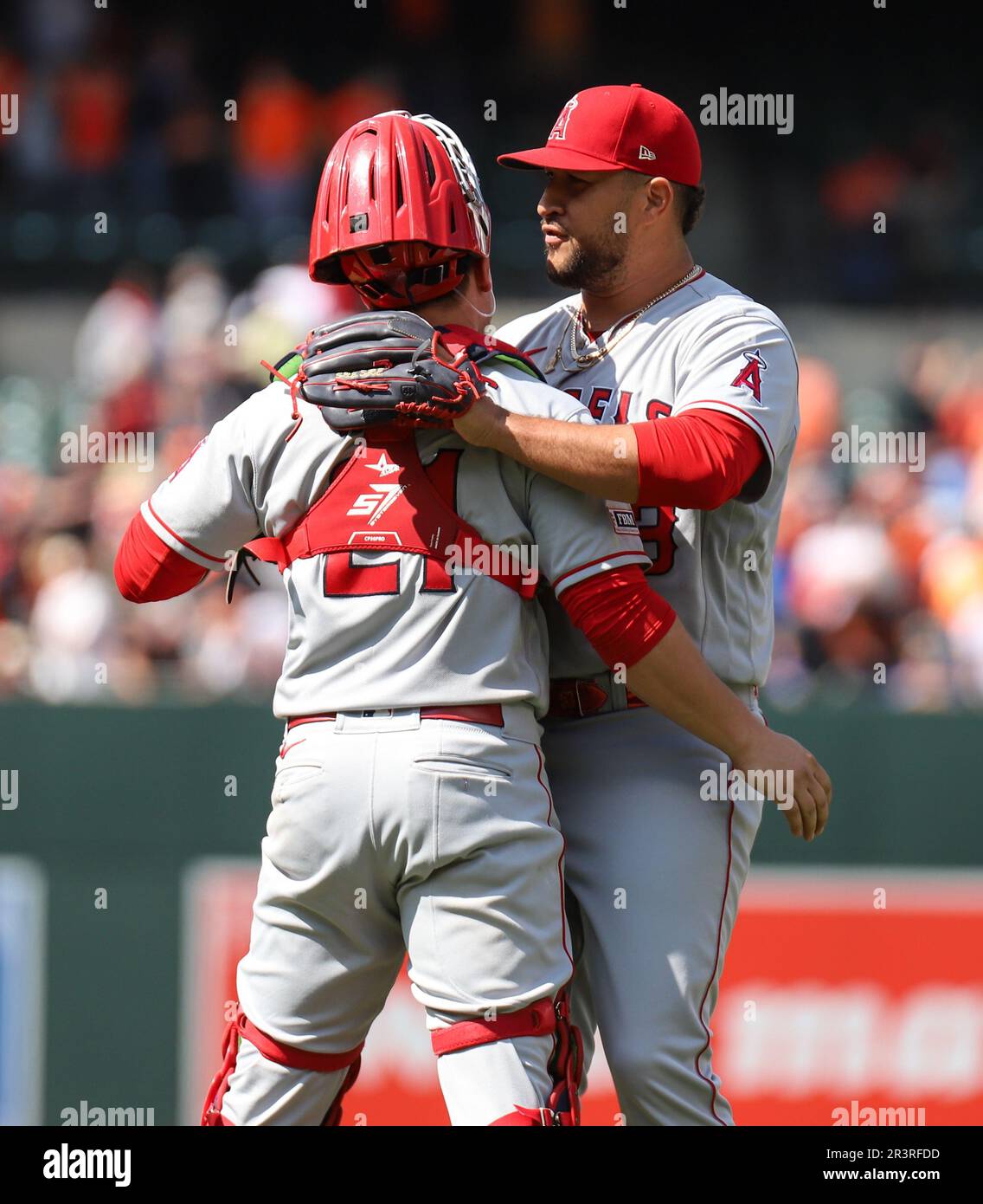 Los Angeles Angels pitcher Carlos Estevez (53) hugs catcher Matt Thaiss ...