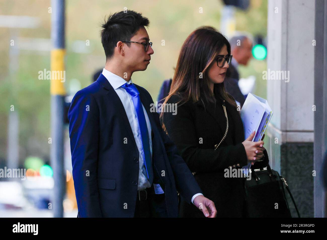 Jeremy So (L) arrives at the John Maddison Tower in Sydney, Thursday ...