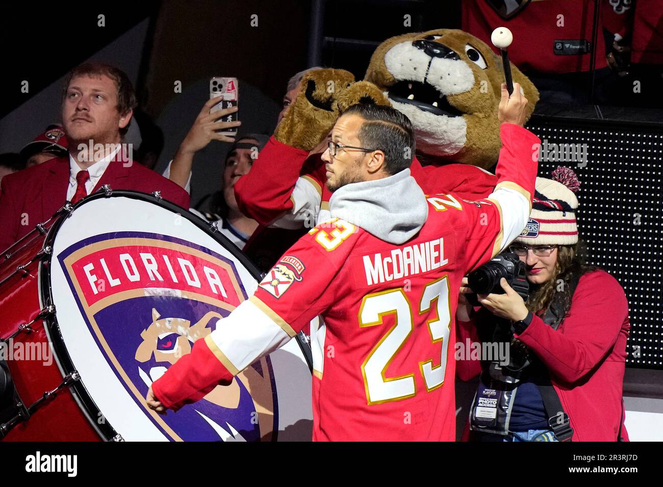 Miami Dolphins coach Mike McDaniel bangs the drum before Game 4 of the ...