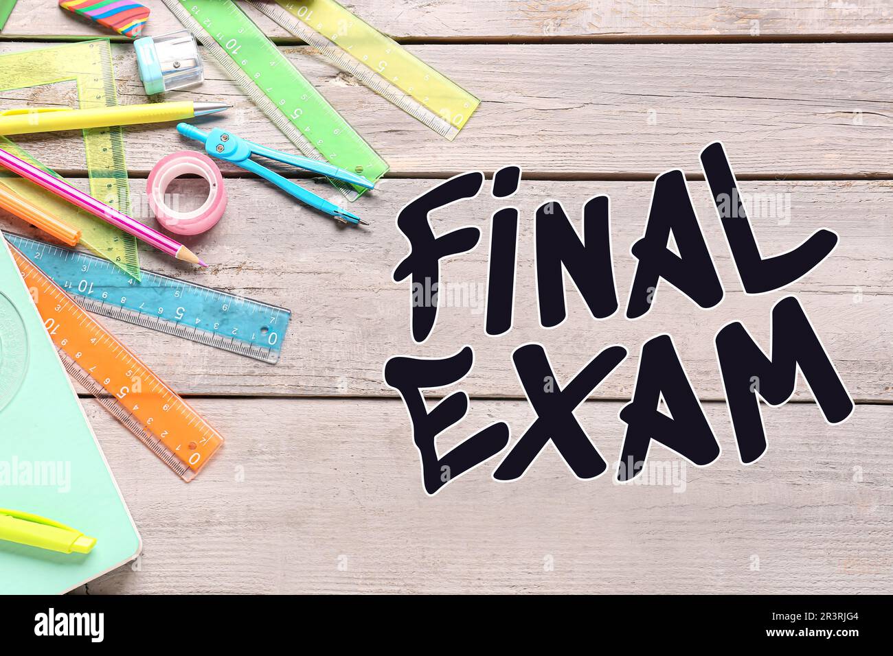 Set of school stationery and text FINAL EXAM on wooden background Stock ...