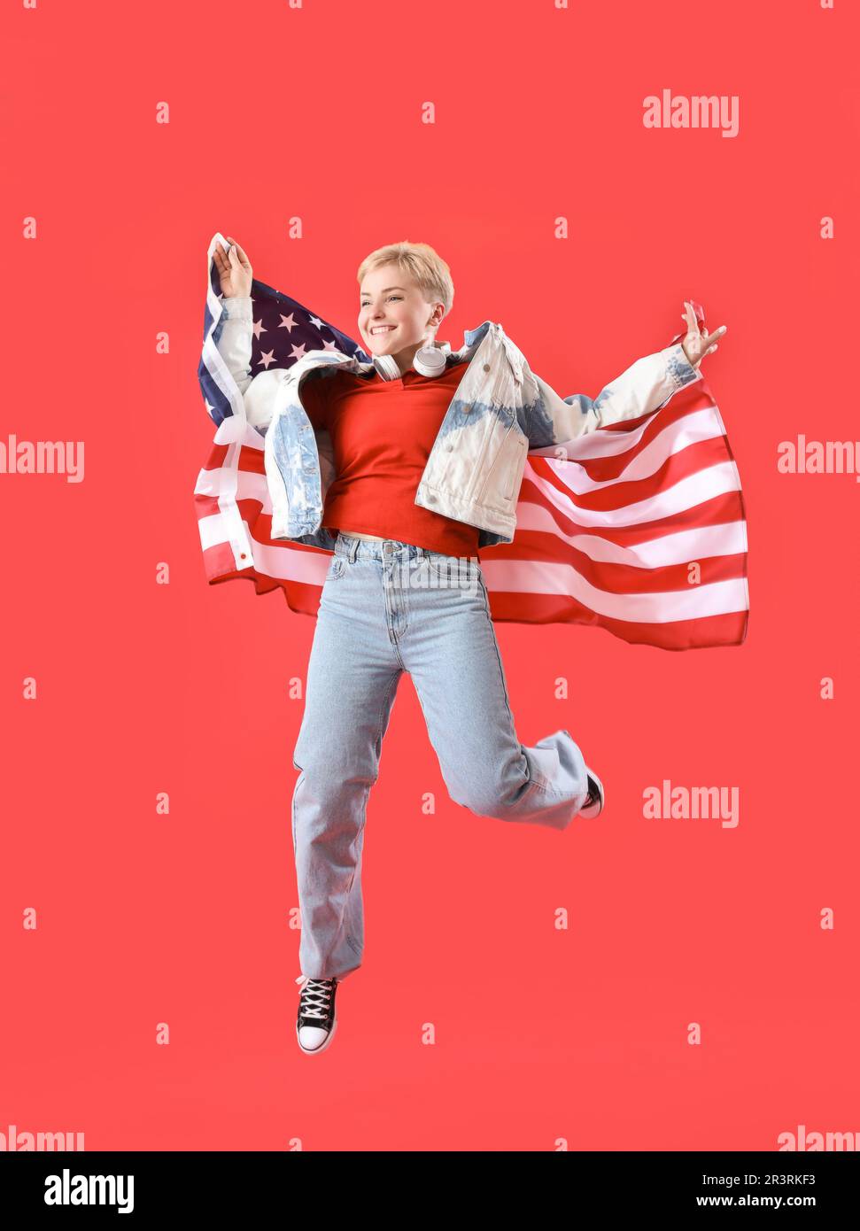 Usa girl jumping flag hi-res stock photography and images - Alamy