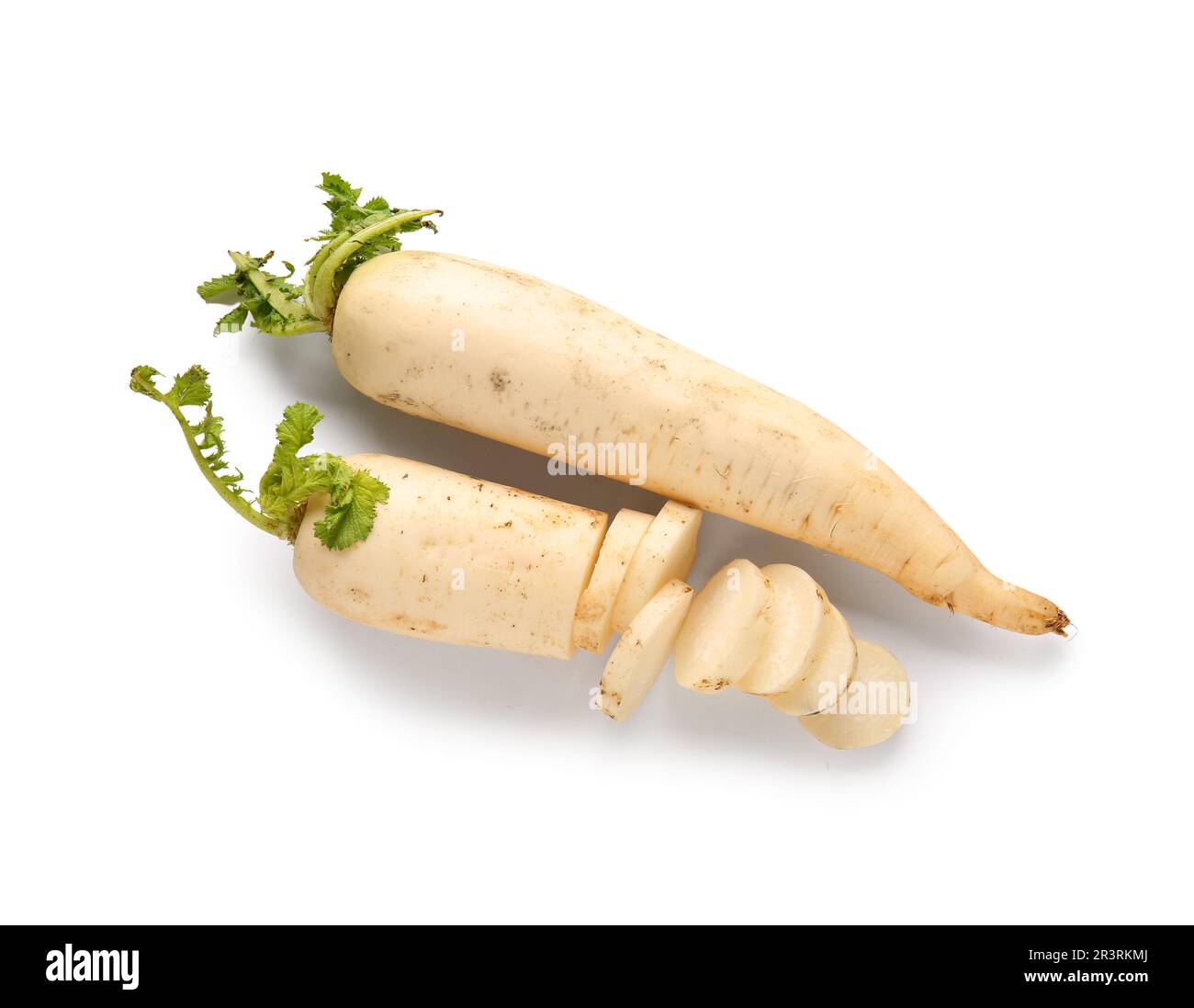 Fresh daikon radishes on white background Stock Photo - Alamy
