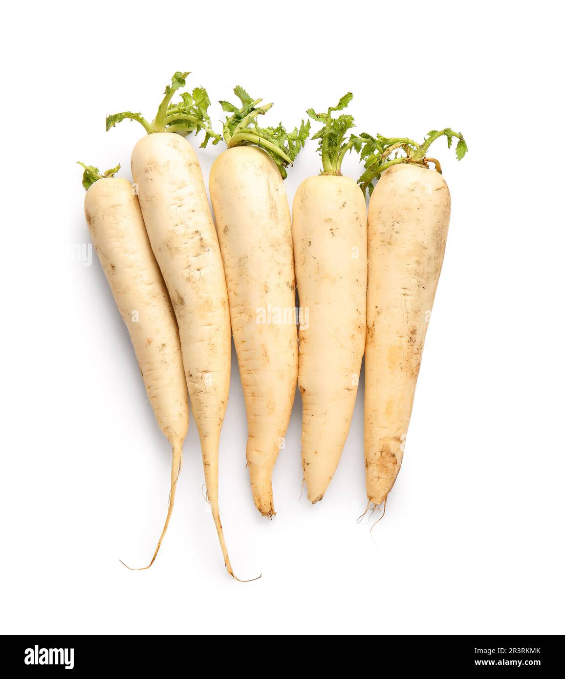 Fresh daikon radishes on white background Stock Photo - Alamy