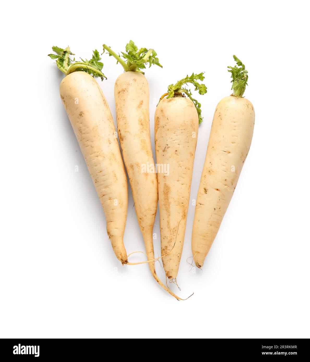 Fresh daikon radishes on white background Stock Photo - Alamy