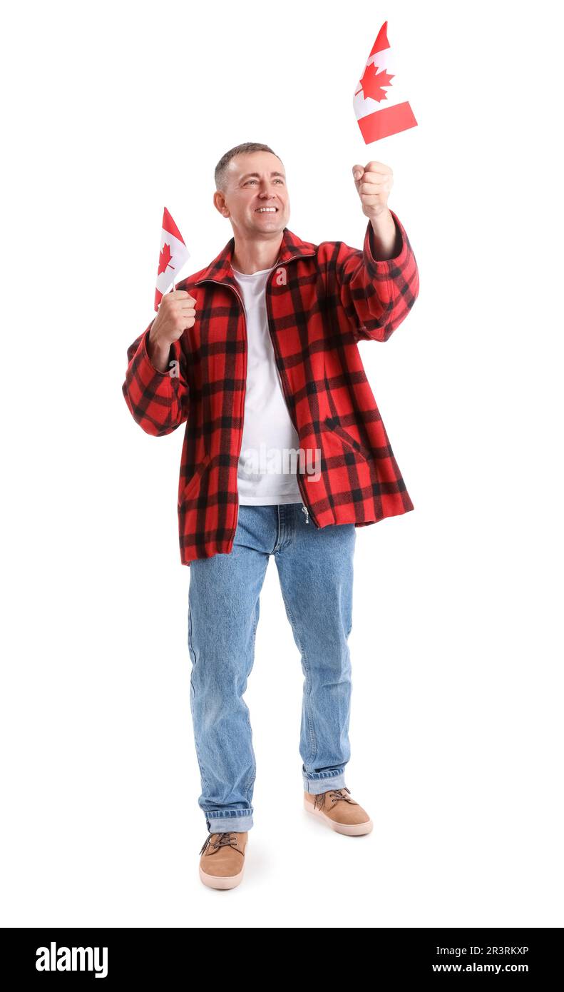 Mature man with flags of Canada on white background Stock Photo - Alamy