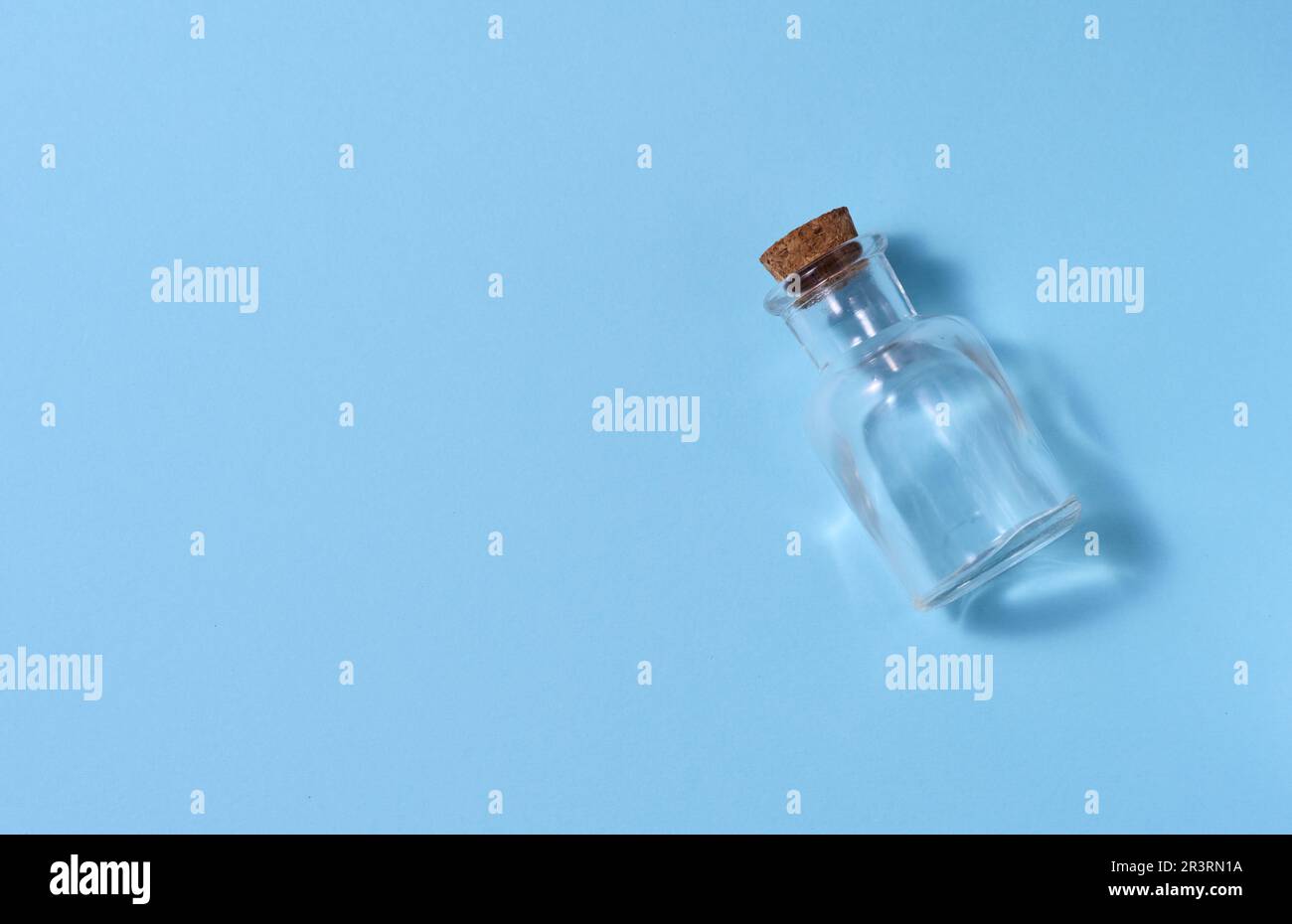 Small blue glass bottle hi-res stock photography and images - Alamy