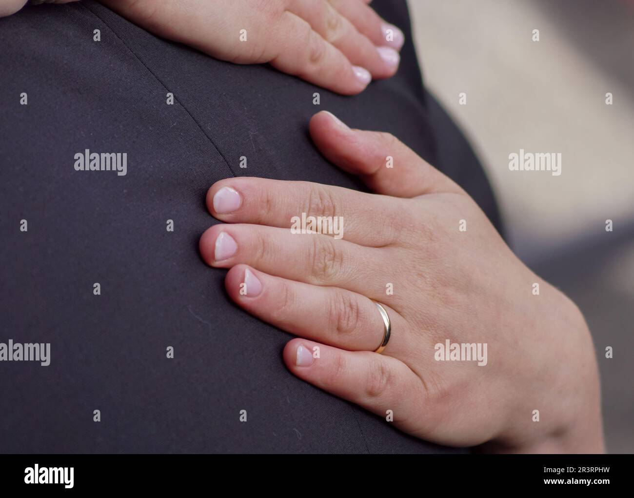 Woman touching her back hi-res stock photography and images - Alamy