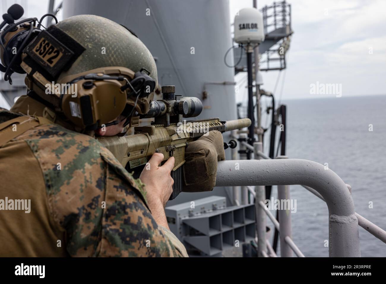 A U.S. Marine with the 26th Marine Expeditionary Unit, sights in on a ...