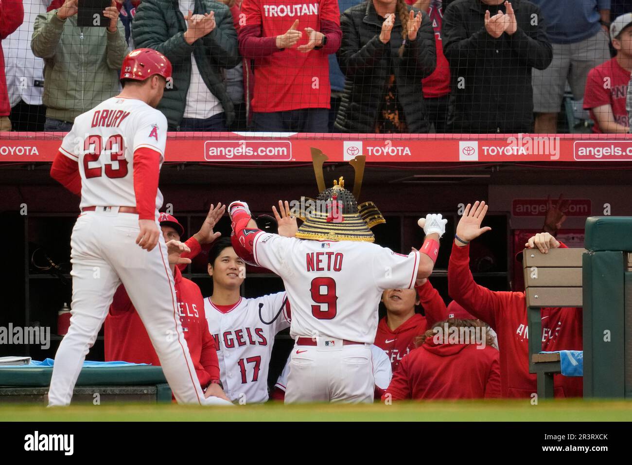 Los Angeles Angels' Zach Neto (9) returns to the dugout after hitting a ...