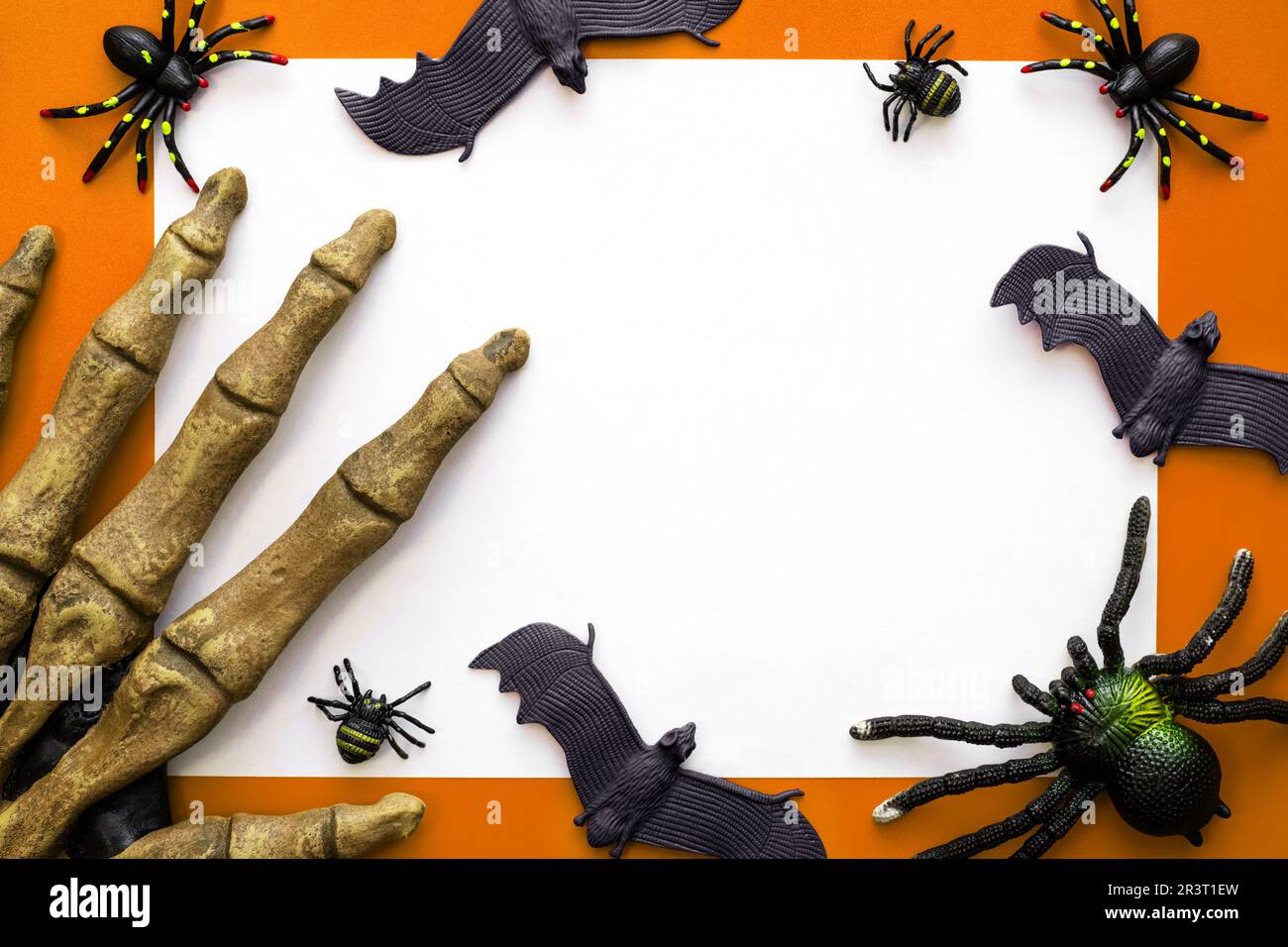 Halloween mock up, blank sheet of paper with spiders, bats and monsters ...