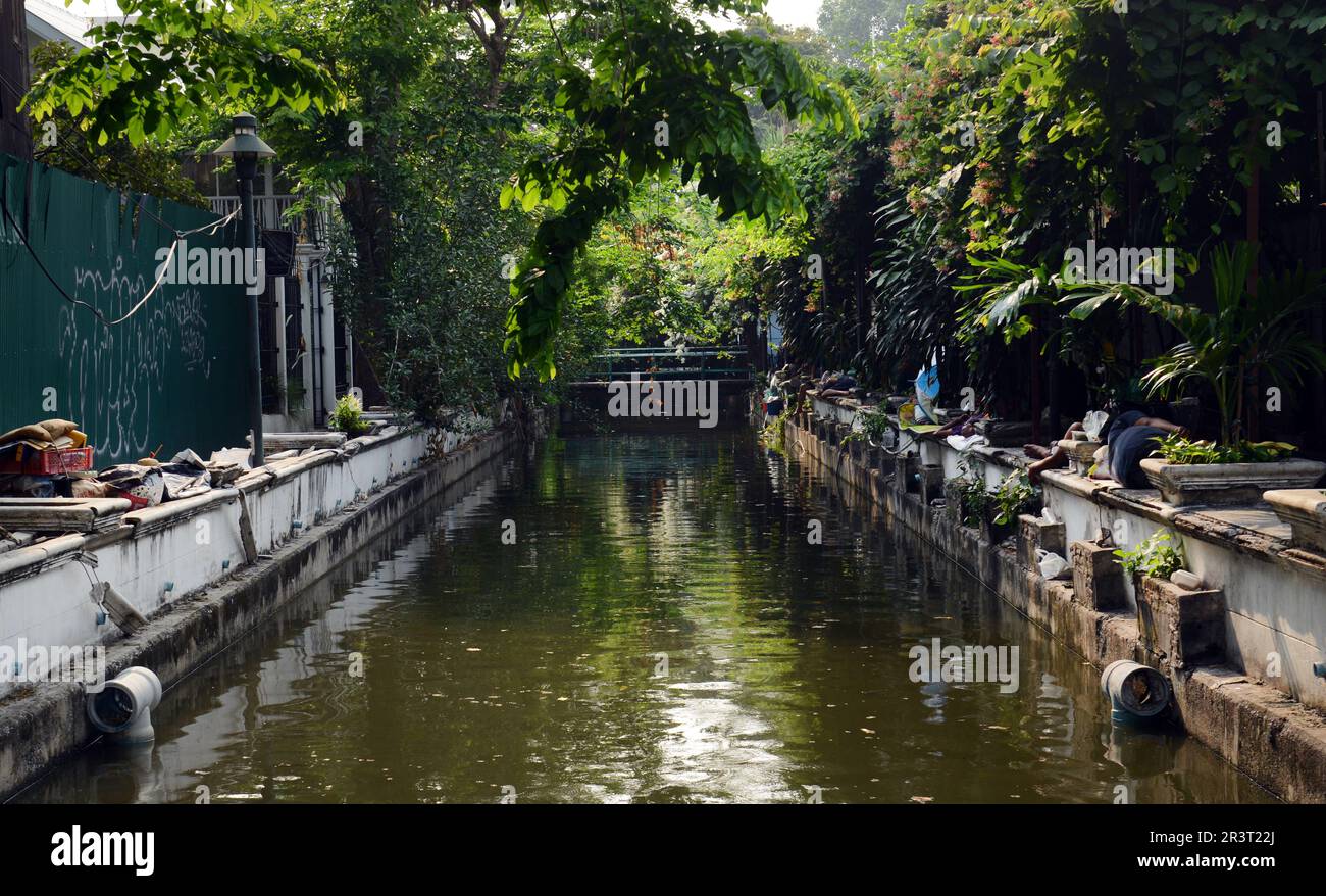 Homeless people living by the canal near Tanao Road in Banglamphu ...