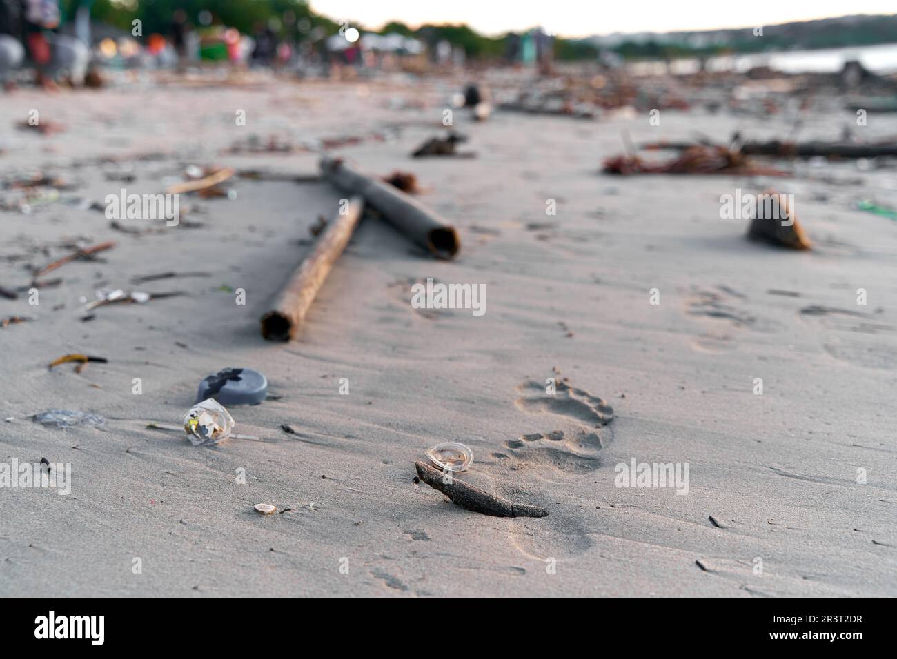 Mountains of waste and garbage on the sandy beach after the tide ...