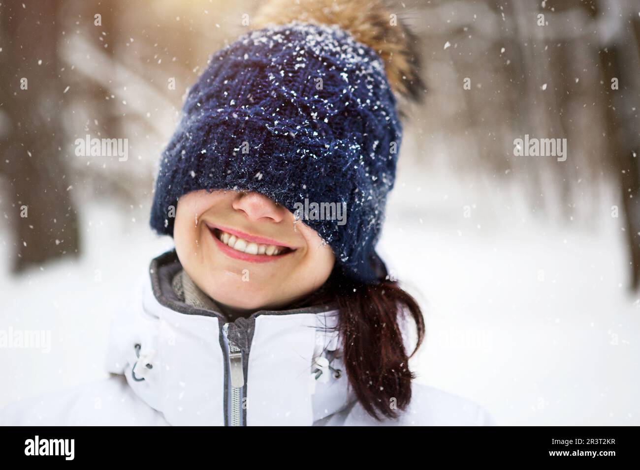 Woman hat over eyes snow hi-res stock photography and images - Alamy