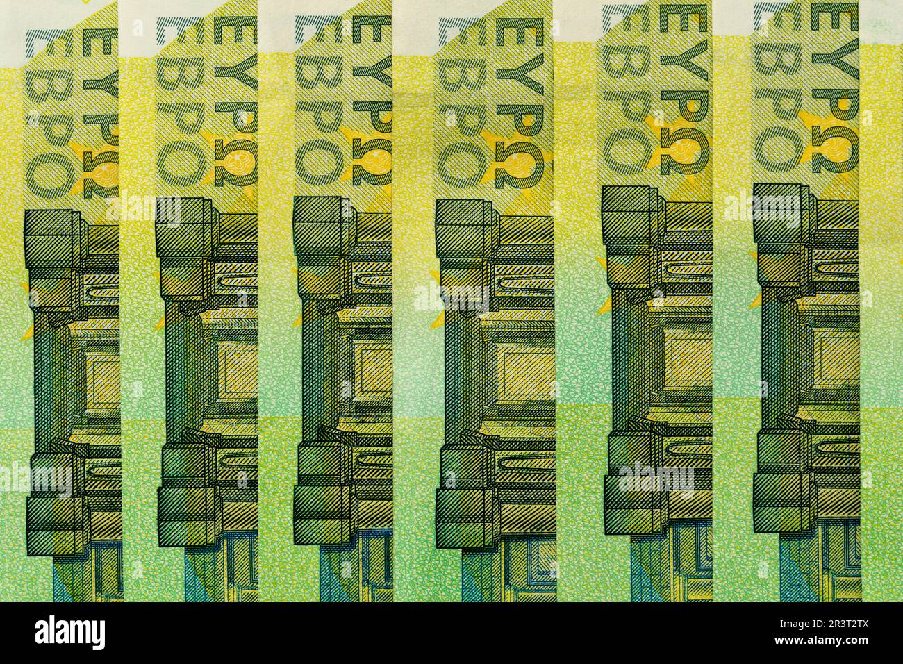 Green banknotes of 100 euros laid out vertically Stock Photo - Alamy