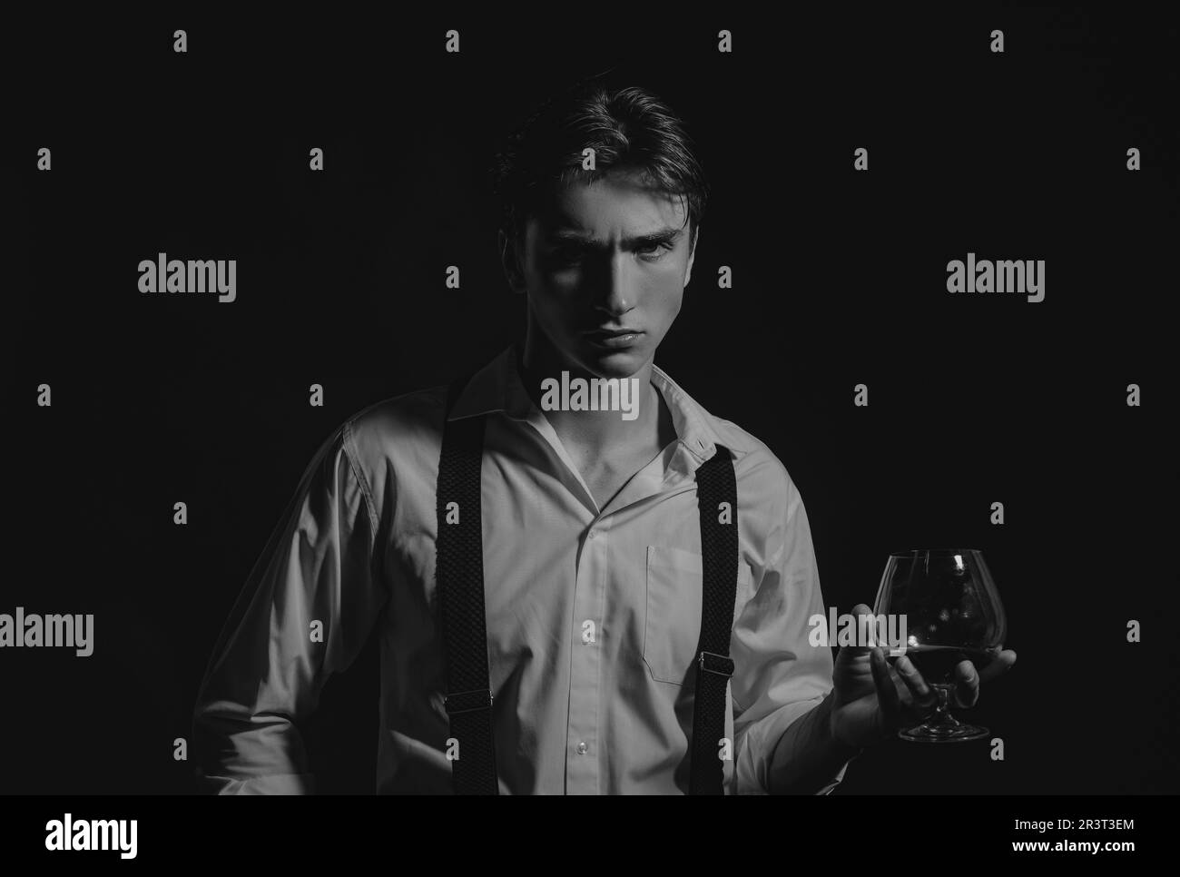 Man drinking whiskey, brandy, cognac. Degustation and tasting. Man with ...