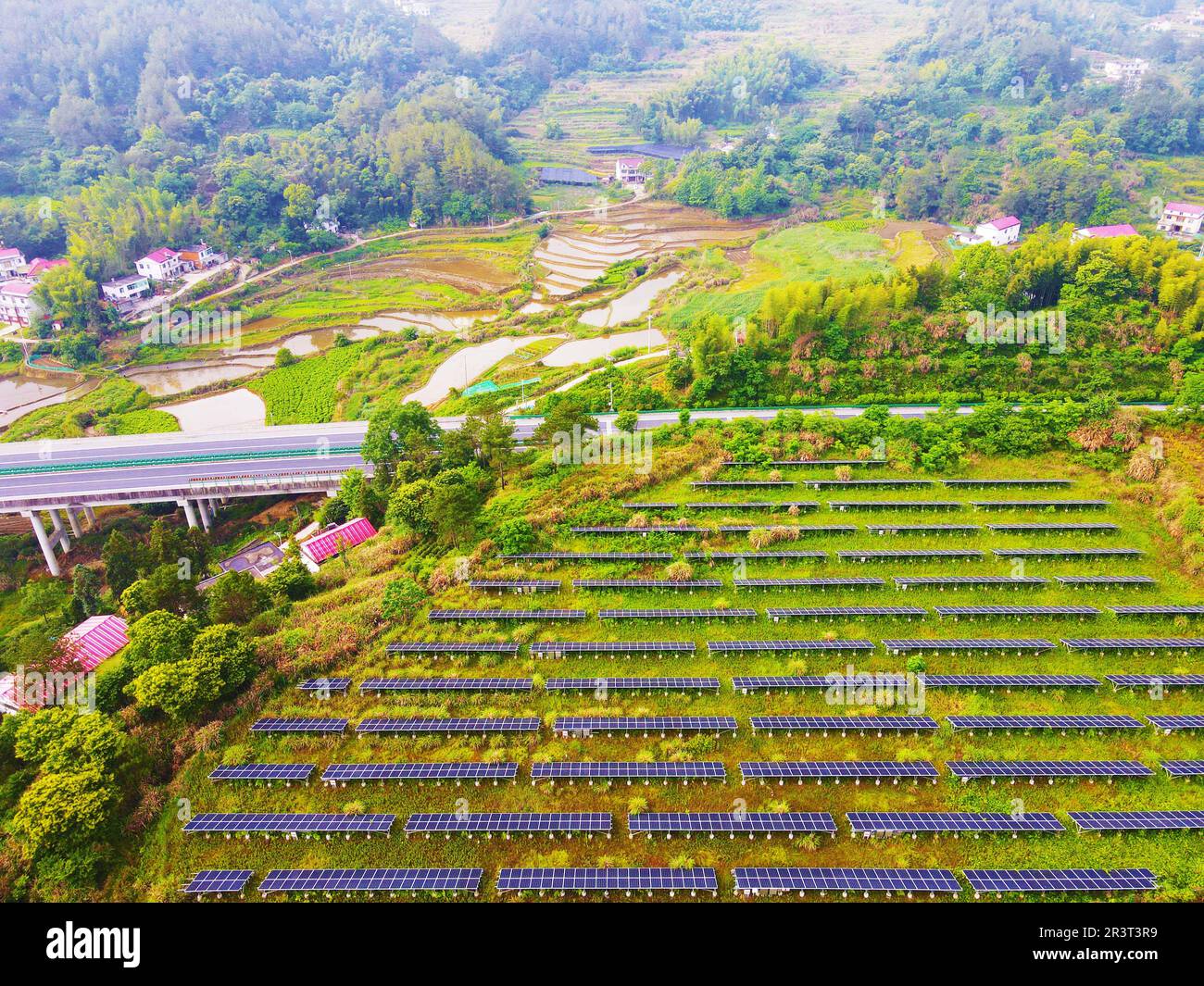 ANQING, CHINA - MAY 25, 2023 - Green hills, roads and solar ...