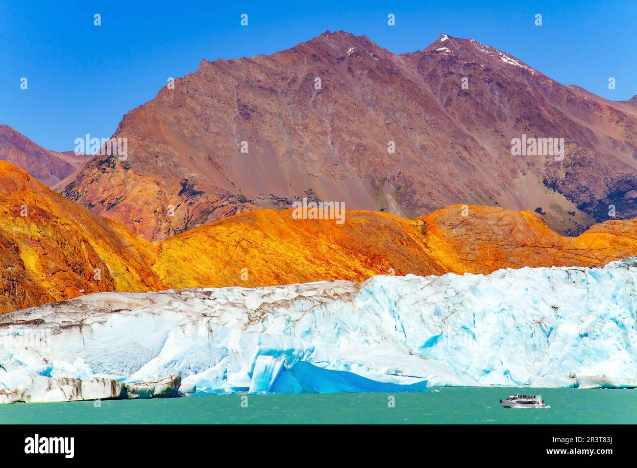 Colorful mountains surround the lake Stock Photo - Alamy