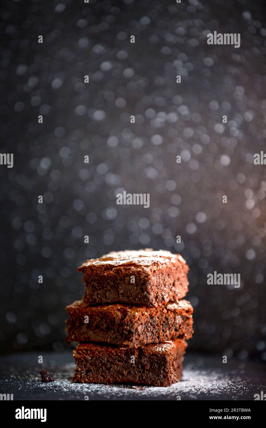 Dark chocolate brownies stack, copy space Stock Photo - Alamy