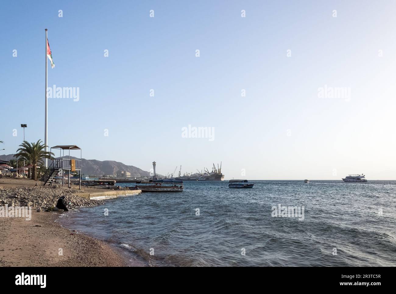 Sunset at Aqaba beach, Jordan's window on the Red Sea. In the ...