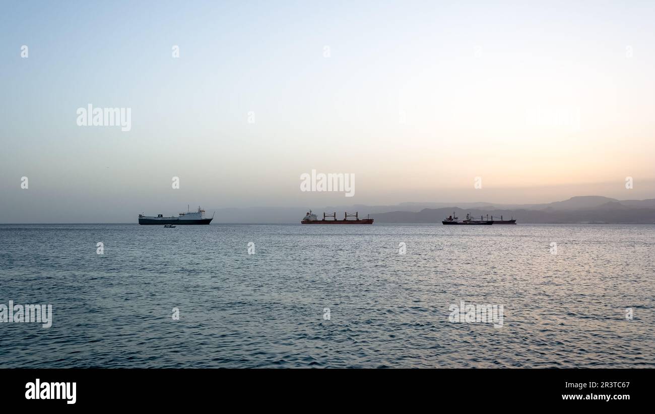 Sunset at Aqaba beach, Jordan's gateway to the Red Sea. Aqaba is ...